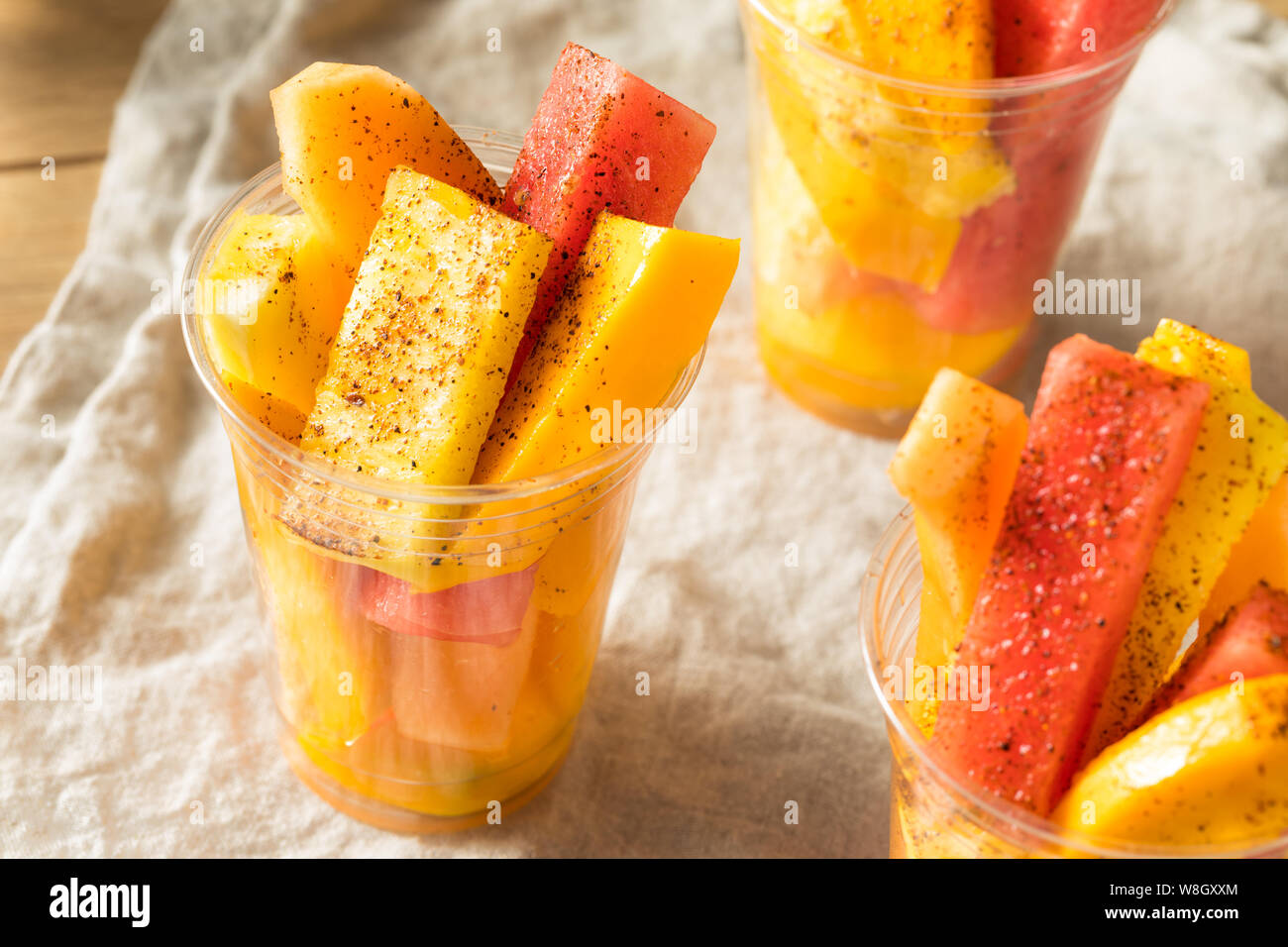 Raw Organic Mexican Fruit Cup with Chili Powder Stock Photo - Alamy