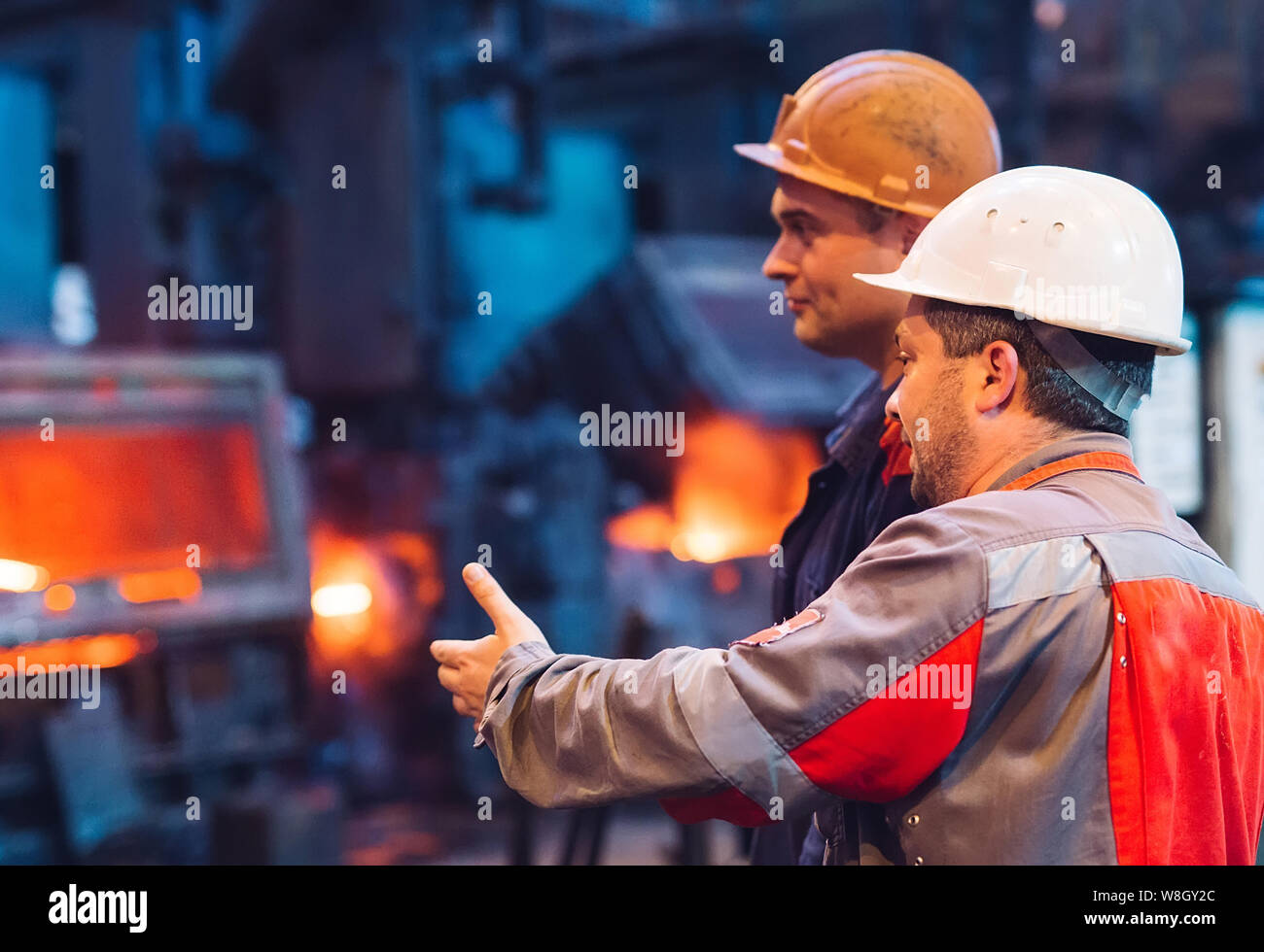 Workers in the steel mill on the metallurgical plant Stock Photo - Alamy