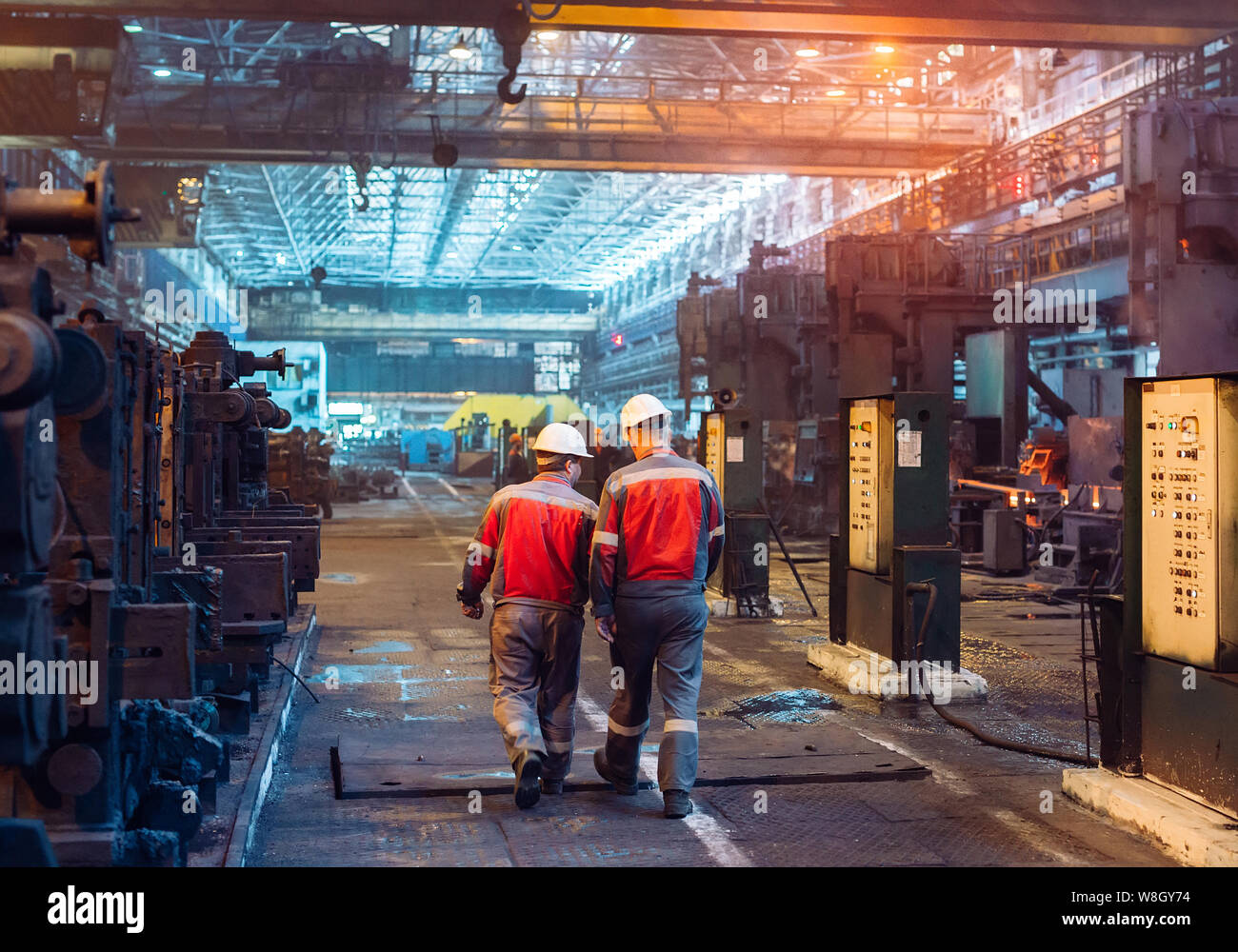 Workers in the steel mill on the metallurgical plant Stock Photo - Alamy