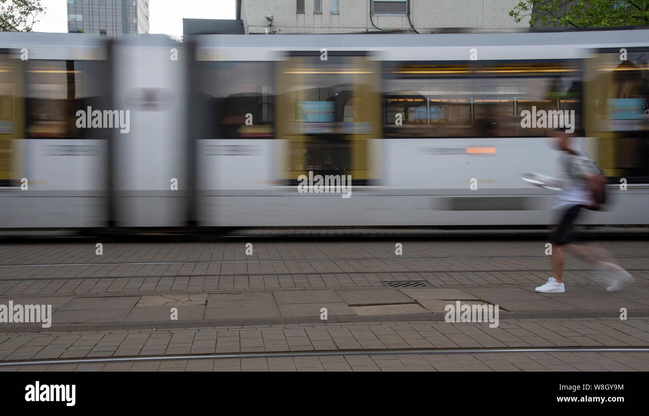 Train moving fast and people walking hi-res stock photography and ...
