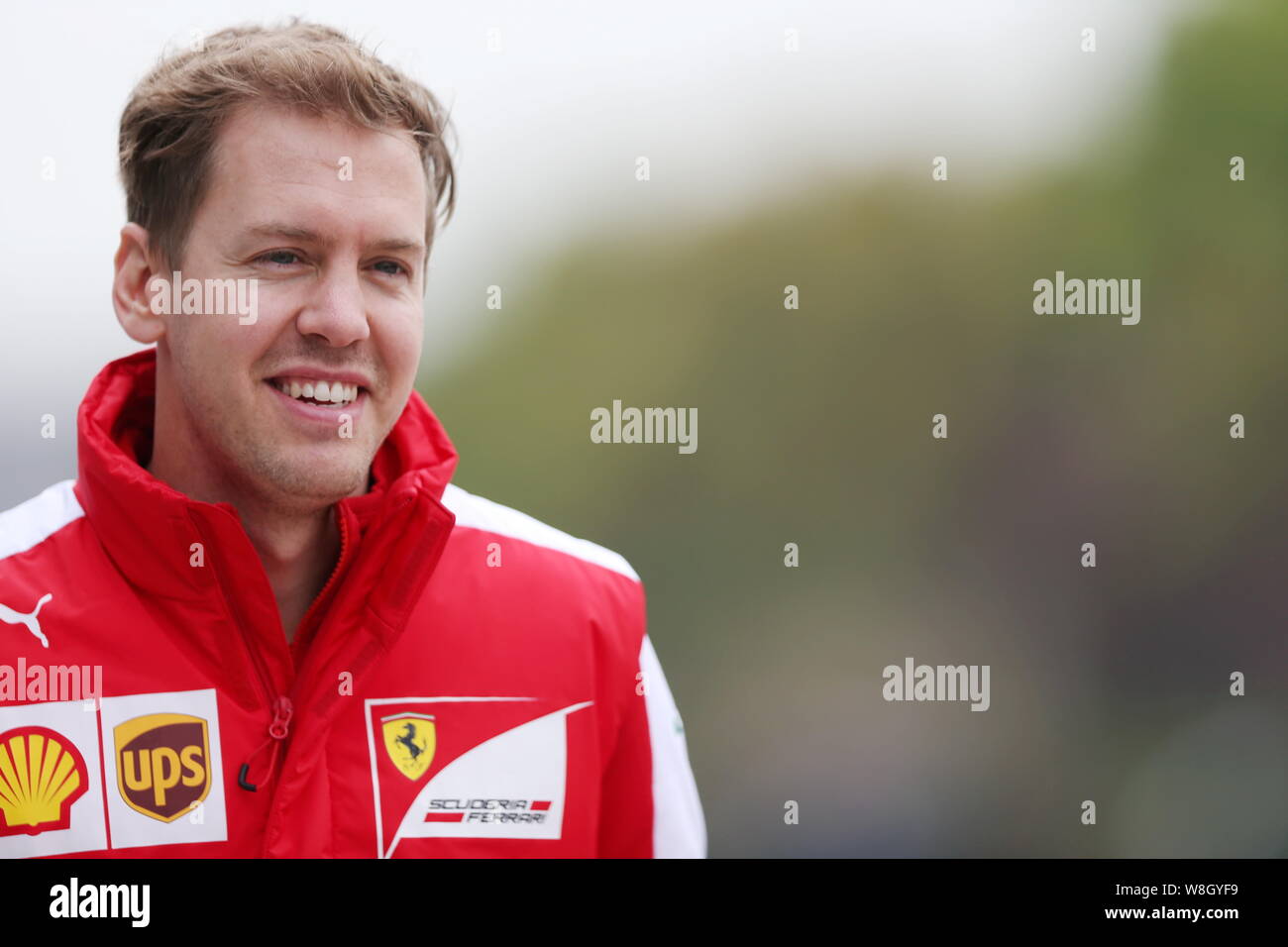 German F1 driver Sebastian Vettel of Ferrari arrives at the Shanghai ...