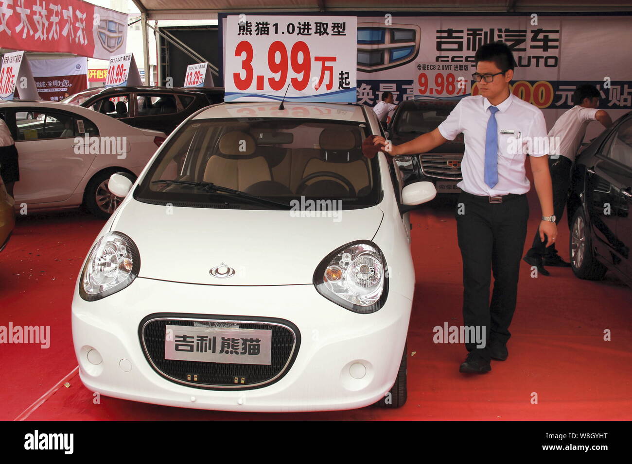 --FILE--A Geely Panda car is displayed during an auto show in Haikou ...