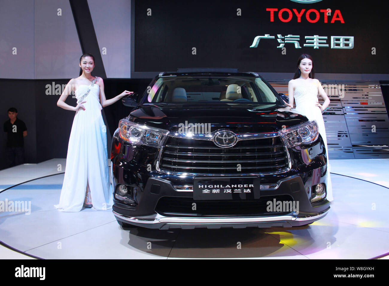 --FILE--Models pose with a Toyota Highlander during an auto show in ...