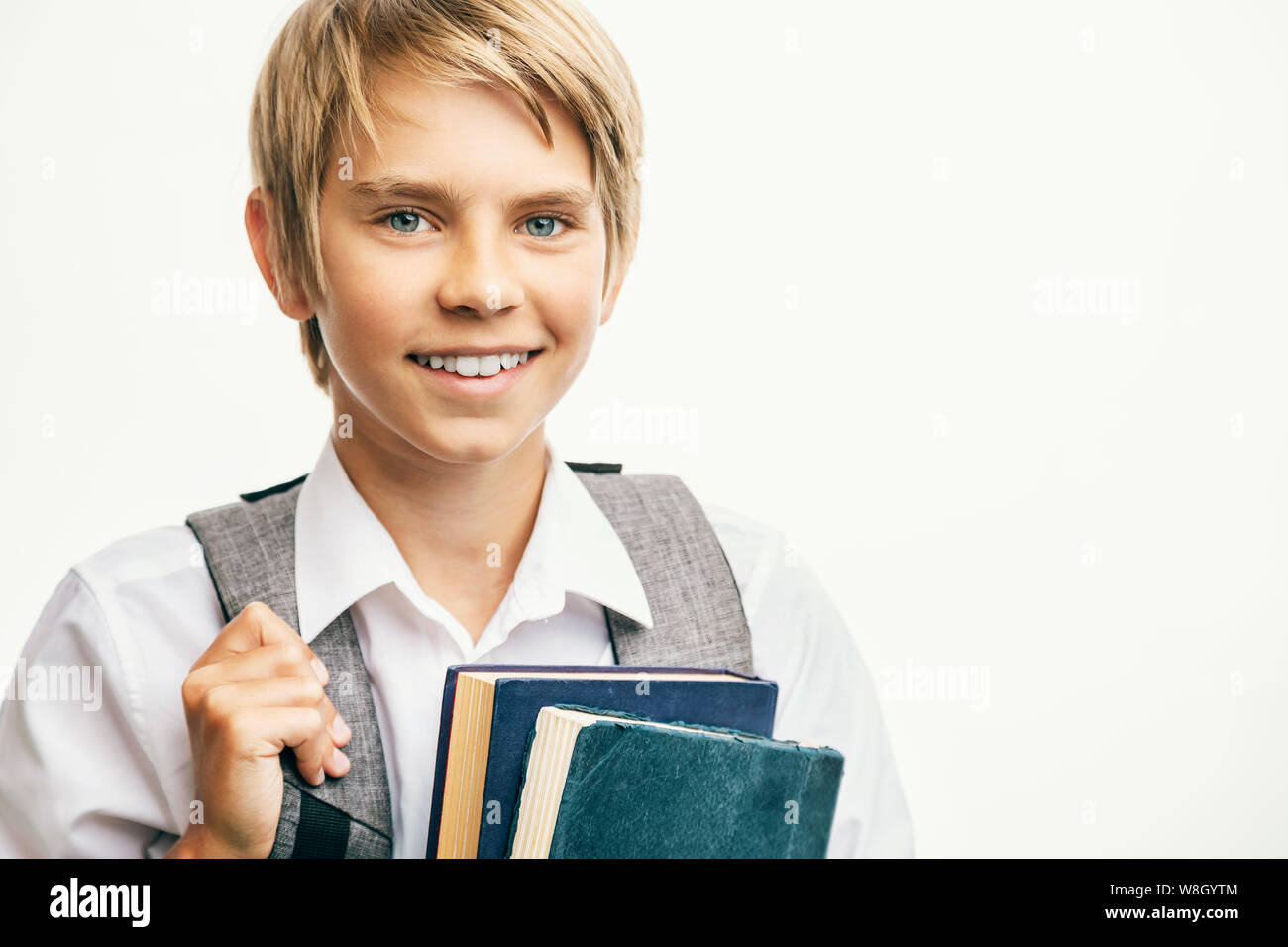 Carrying books boy hi-res stock photography and images - Alamy