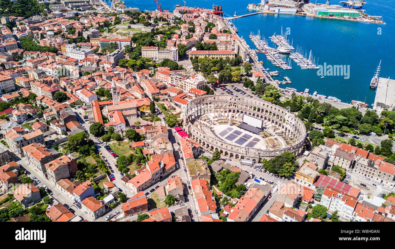 Aerial shoot of Arena ancient Roman amphitheater - Old town Pula, Istra ...