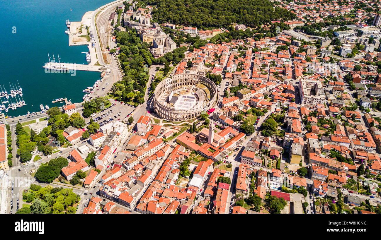 Aerial shoot of Arena ancient Roman amphitheater - Old town Pula, Istra ...