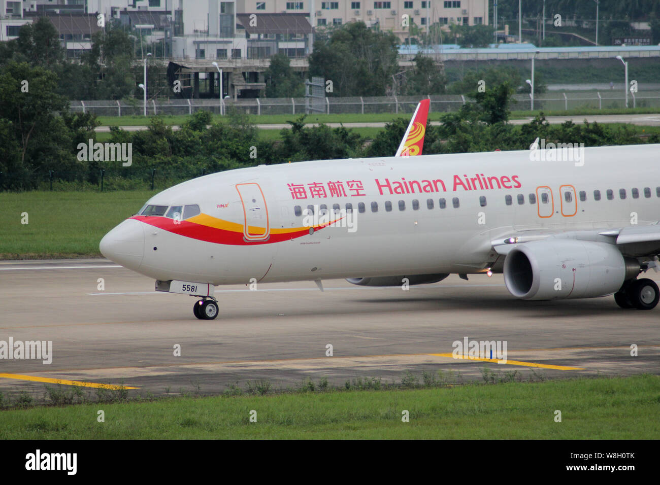 --FILE--A jet plane of Hainan Airlines takes off at the Sanya Phoenix ...