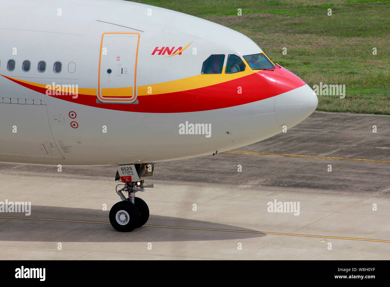 --FILE--A jet plane of Hainan Airlines of HNA Group takes off at the ...