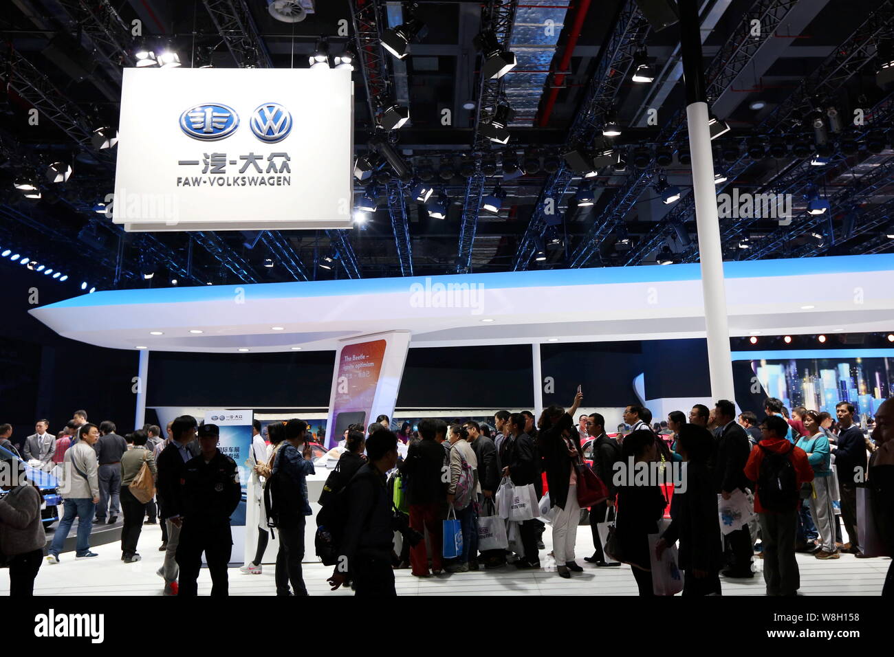 --FILE--People visit the stand of FAW-Volkswagen, a joint venture ...
