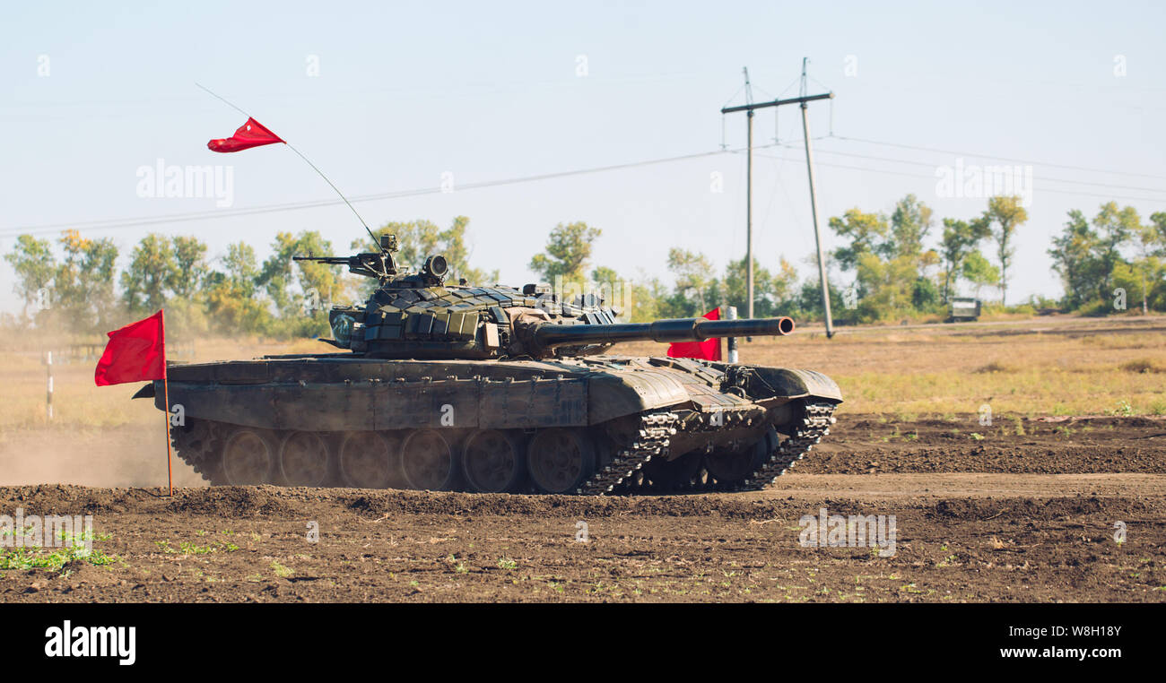 Armored Tank rides on off-road. Tank exercises in the countryside Stock ...