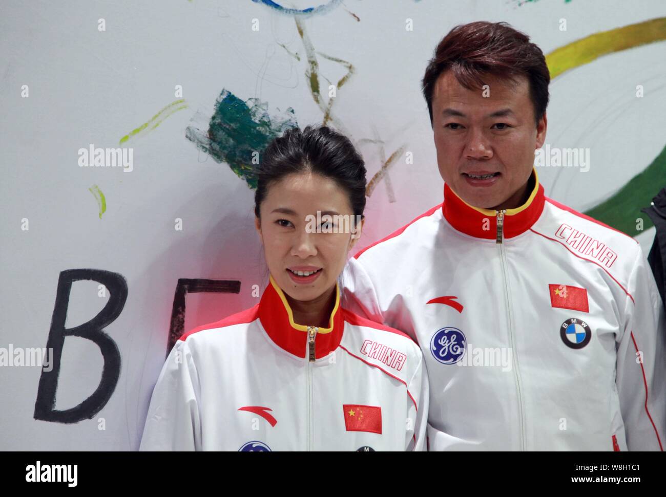 Chinese figure skating couple Shen Xue, left, and Zhao Hongbo attends ...