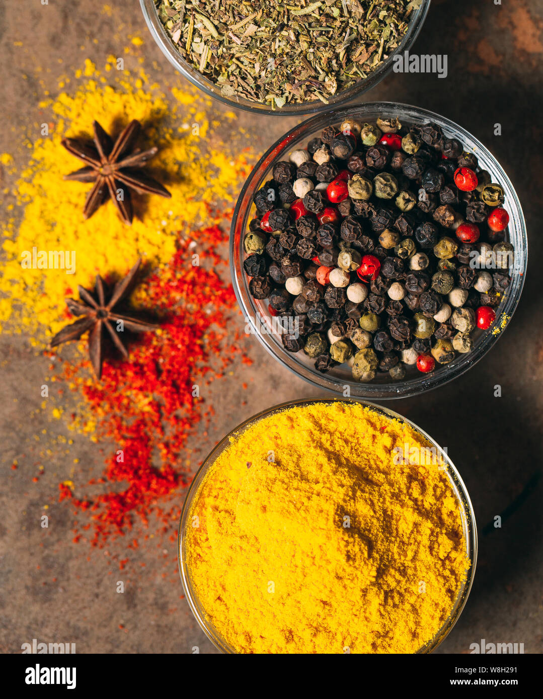 The Different Spices. Spices on stone background Stock Photo - Alamy