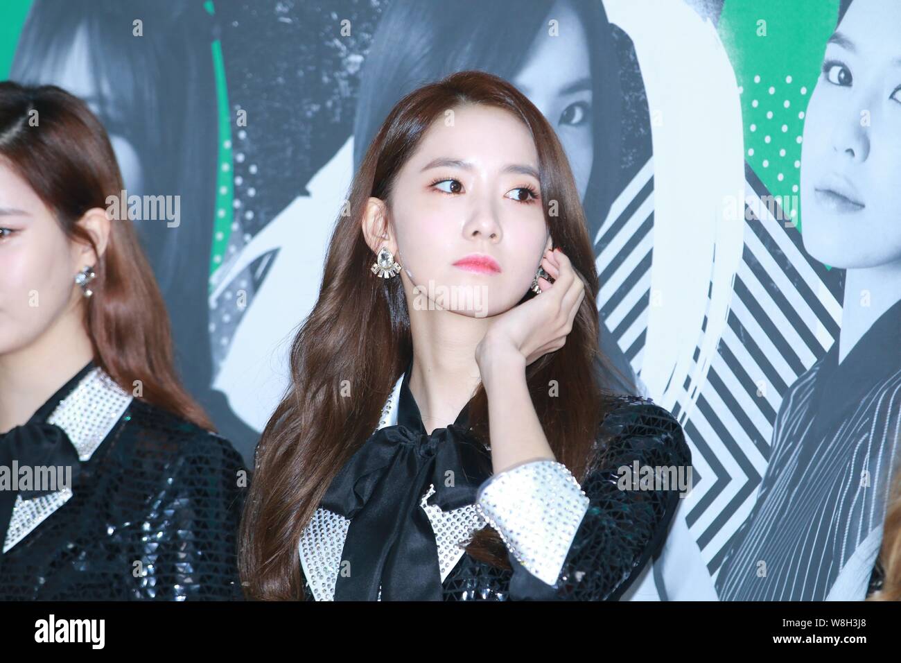 Members of South Korean girl group Girls' Generation attend a press ...