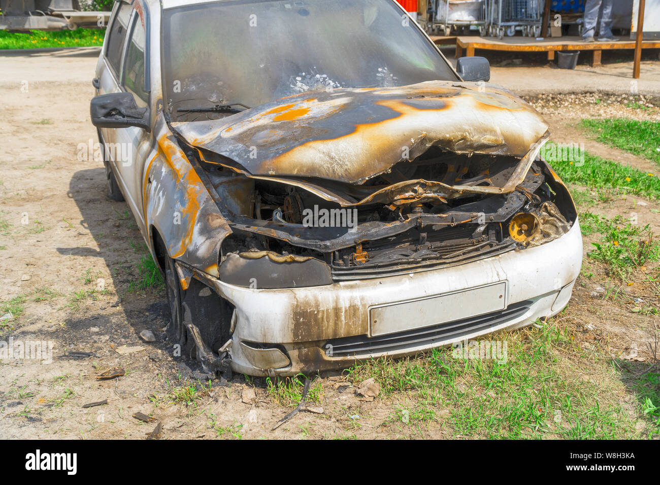 Burnt car on the street. Front view Stock Photo - Alamy