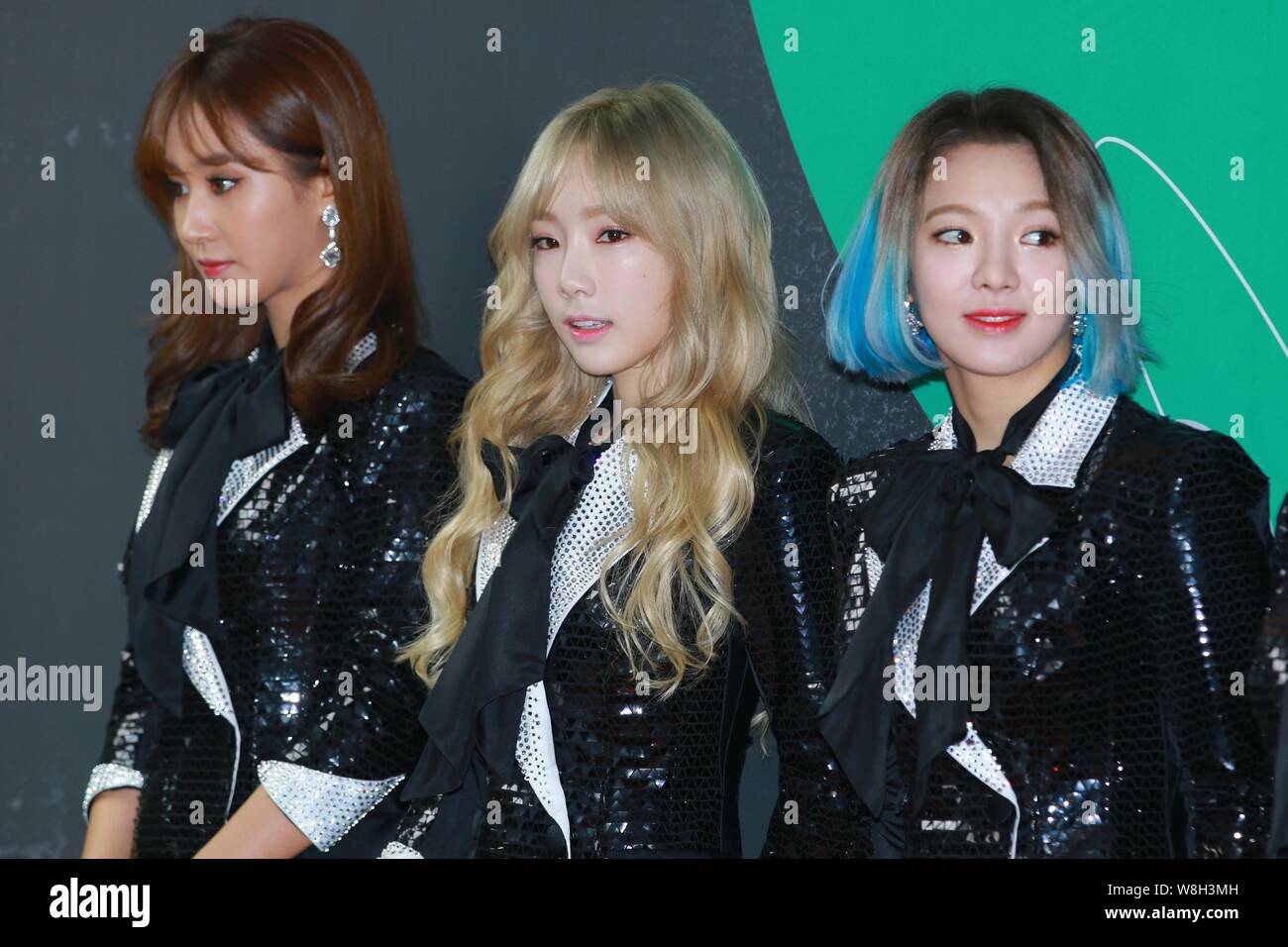 Members of South Korean girl group Girls' Generation attend a press ...