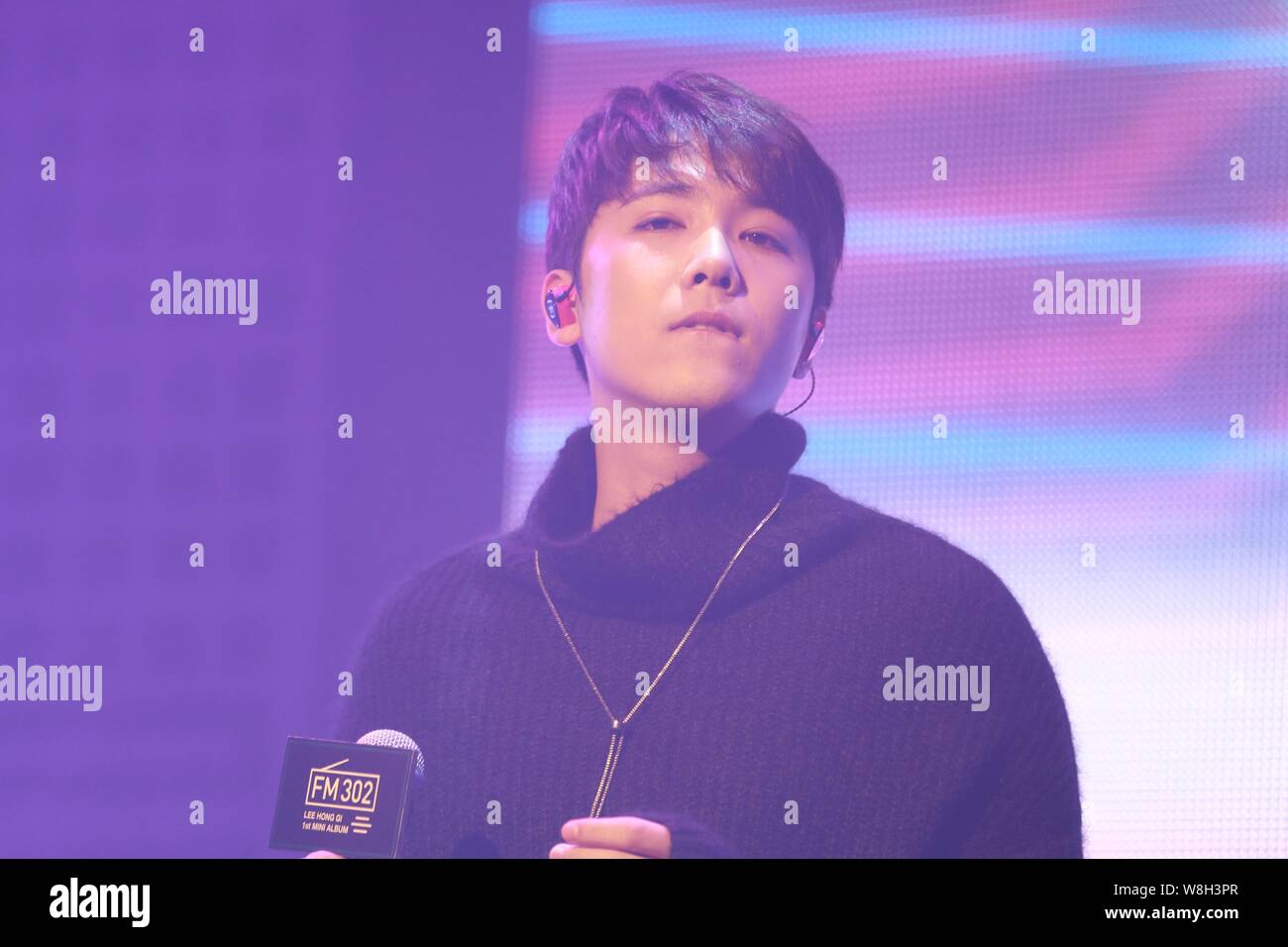 Singer and actor Lee Hong-gi of South Korean boy group FTISLAND reacts ...