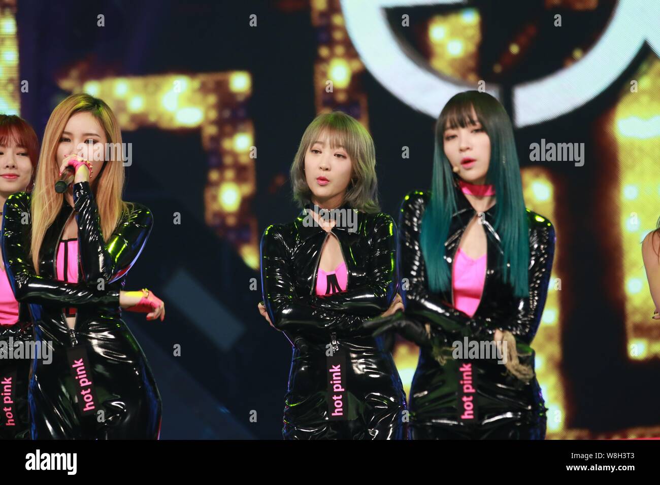 Members of South Korean girl group EXID perform during a filming ...
