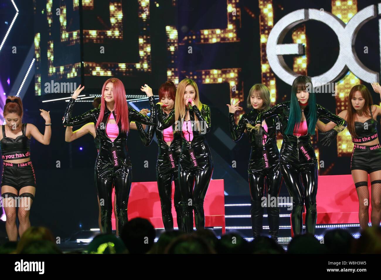 Members of South Korean girl group EXID perform during a filming session for the music ...