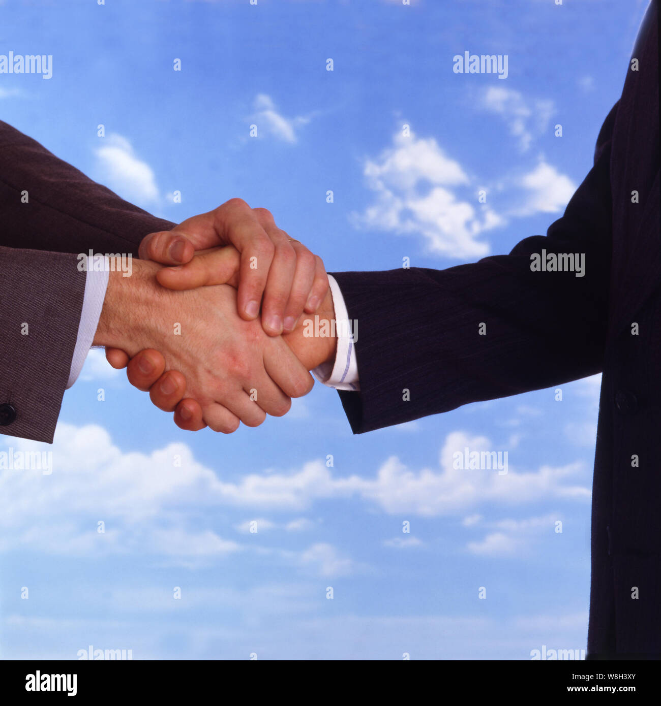 Business men shaking hands Stock Photo - Alamy