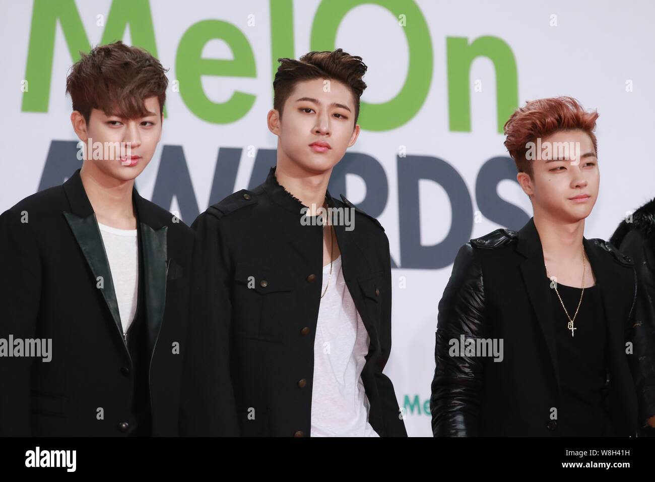 Members of South Korean boy group iKON arrive on the red carpet for the ...