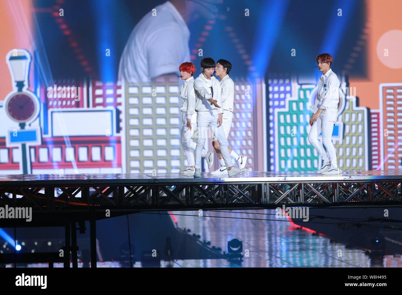Members of Chinese-South Korean boy group EXO perform during their ...
