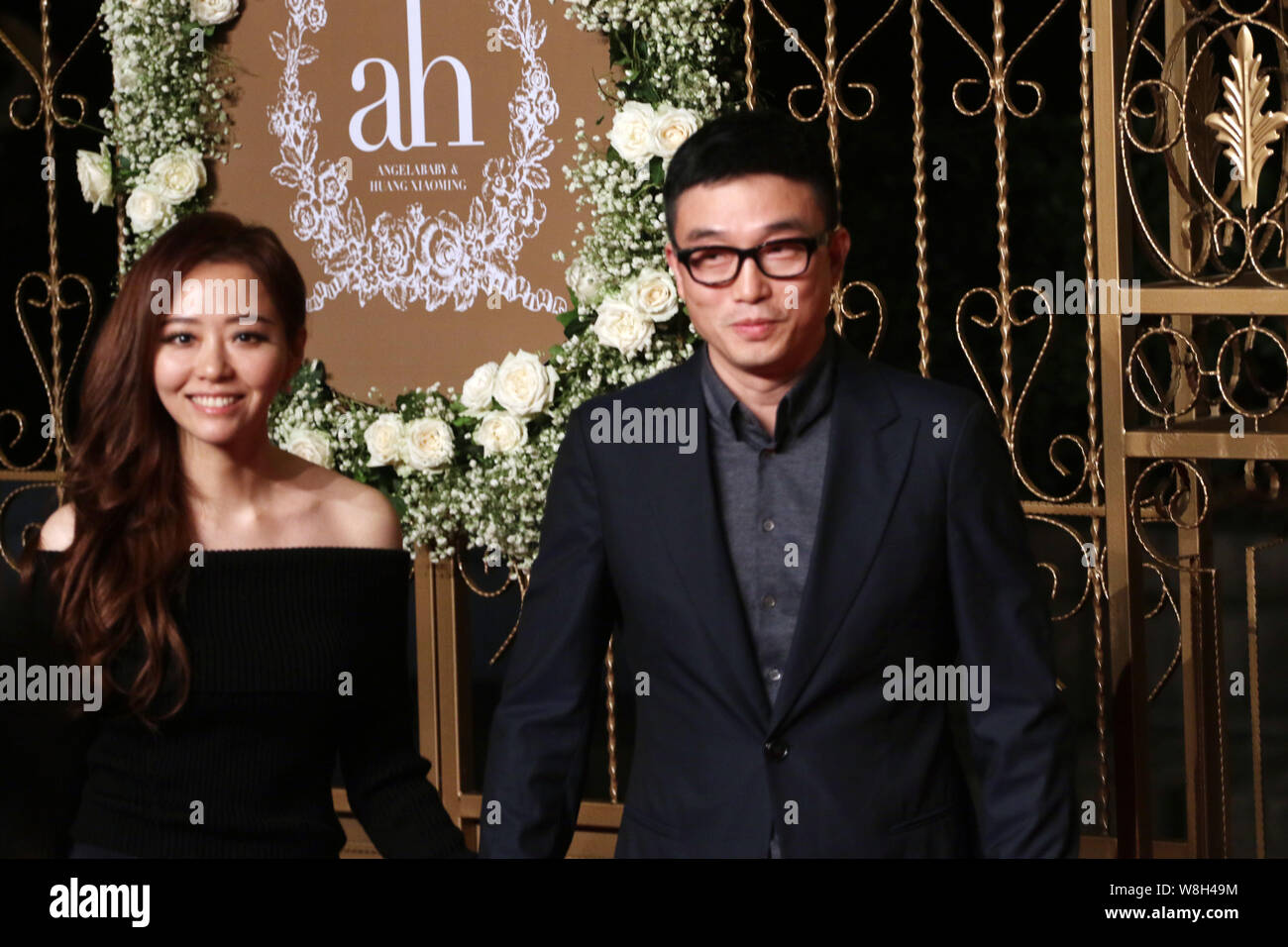 Chinese singer Zhang Liangying, left, and her boyfriend Feng Ke arrive ...