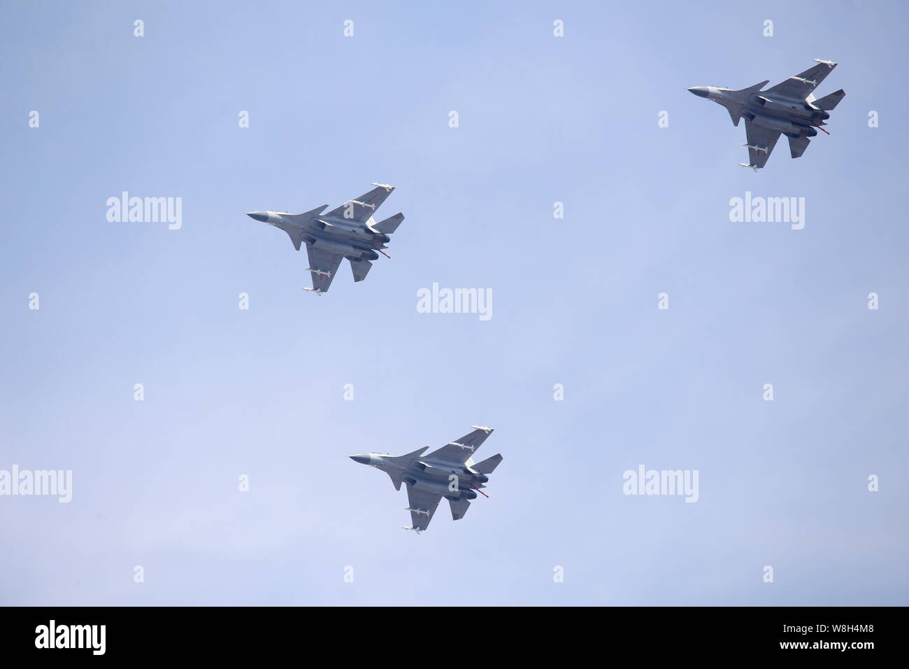 J-15 carrier-based fighter jets fly in formation over Tiananmen Square ...