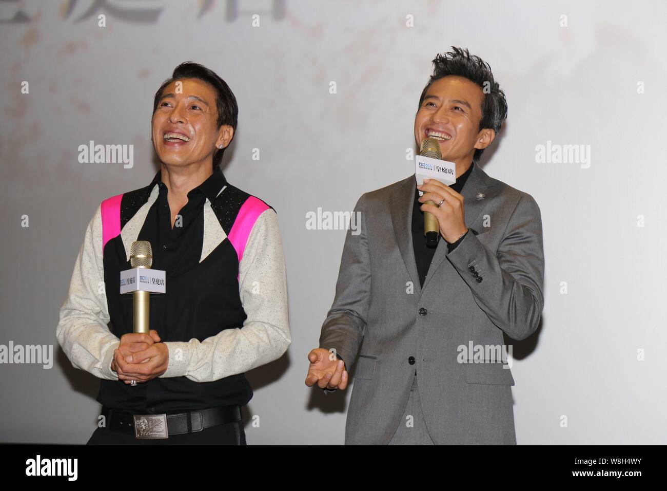 Hong Kong actor Jackie Lui, left, and Chinese actor Deng Chao laugh at ...