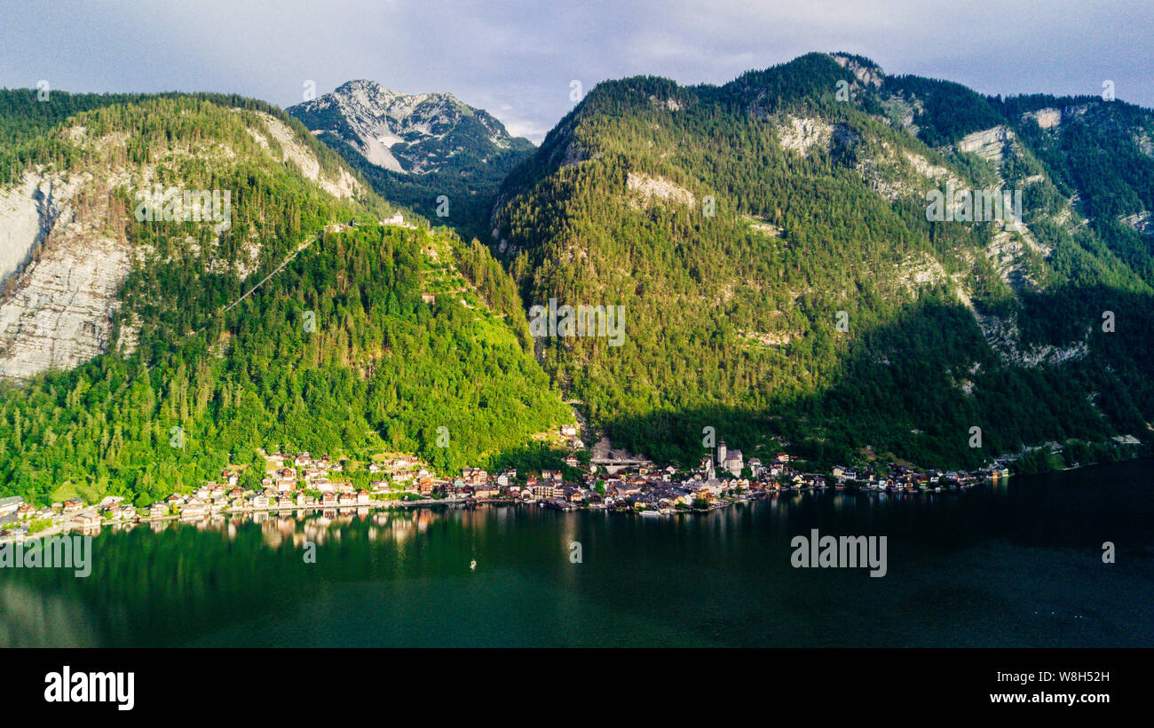 Aerial view from above on famous historical Hallstatt town on ...