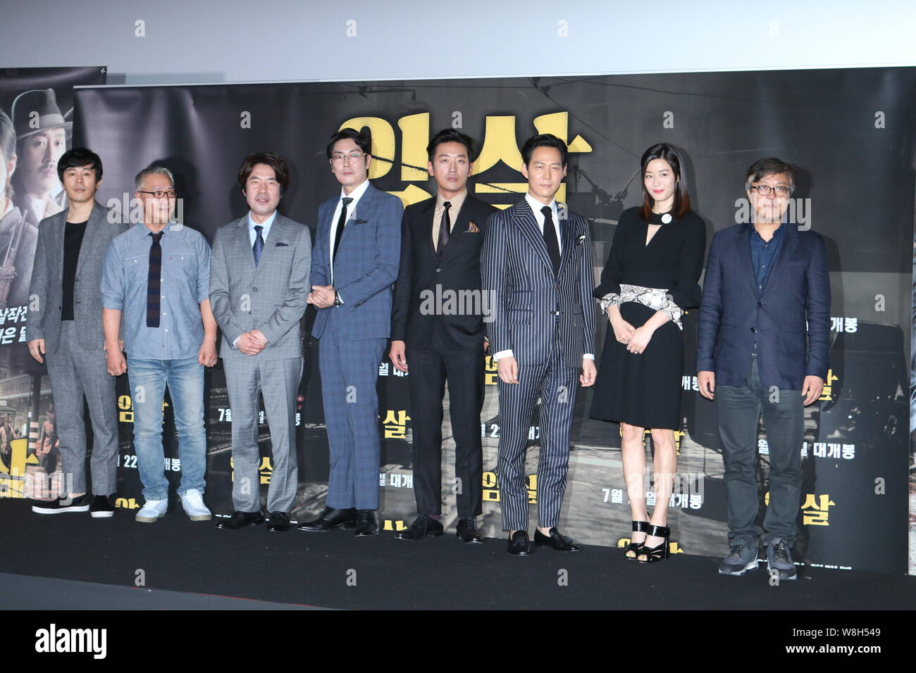 Cast members pose during a preview for their movie "Assassination" in ...