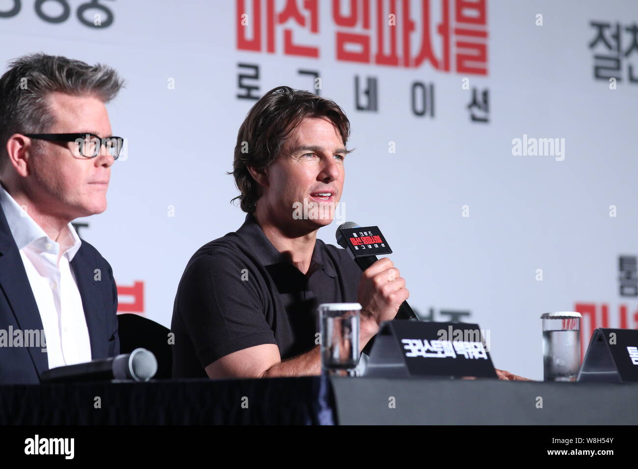 American actor Tom Cruise, right, speaks during a press conference for ...