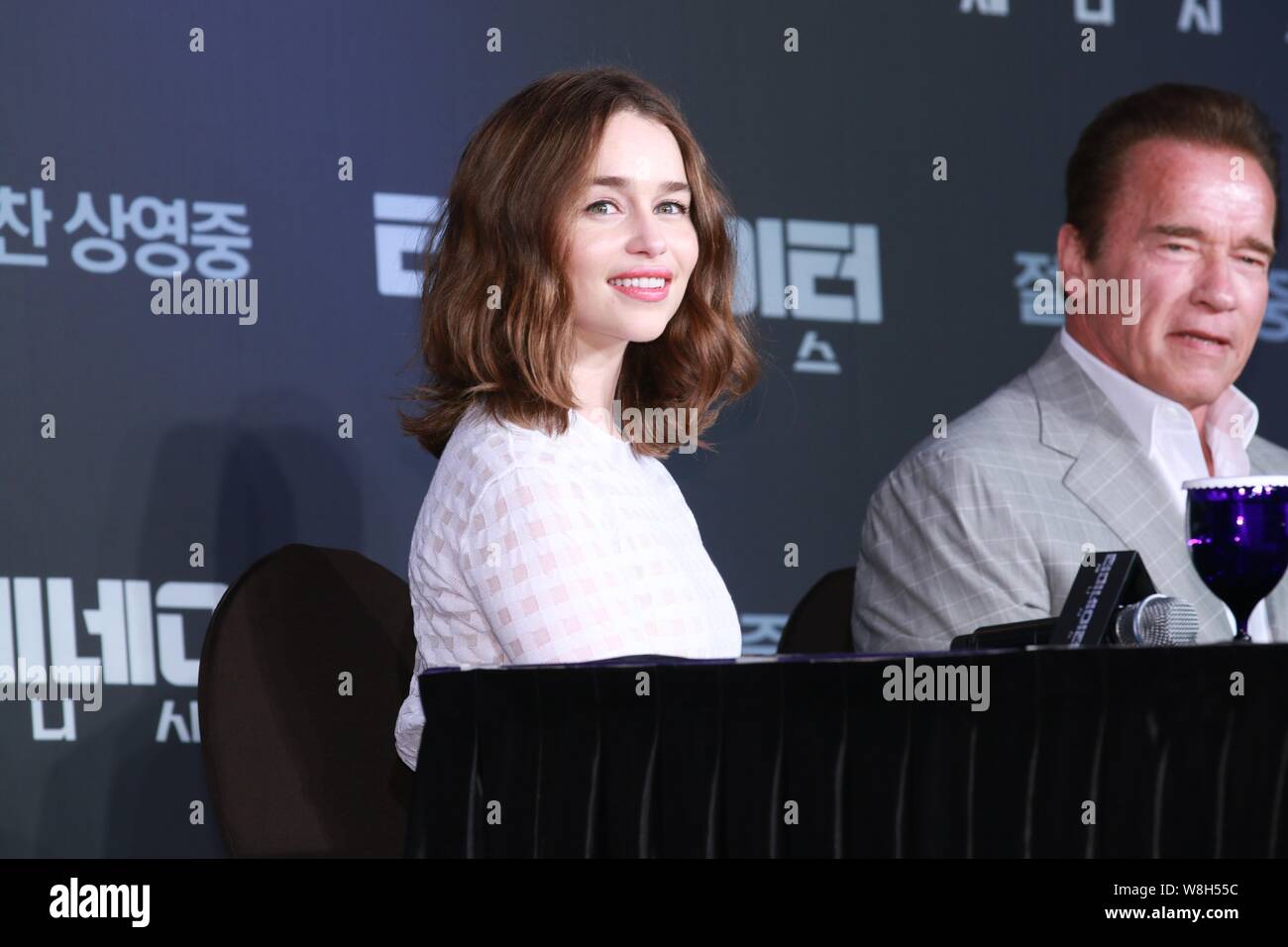 British actress Emilia Clarke, left, smiles next to American actor ...