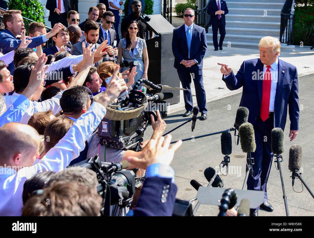 United States President Donald J. Trump takes questions from reporters ...