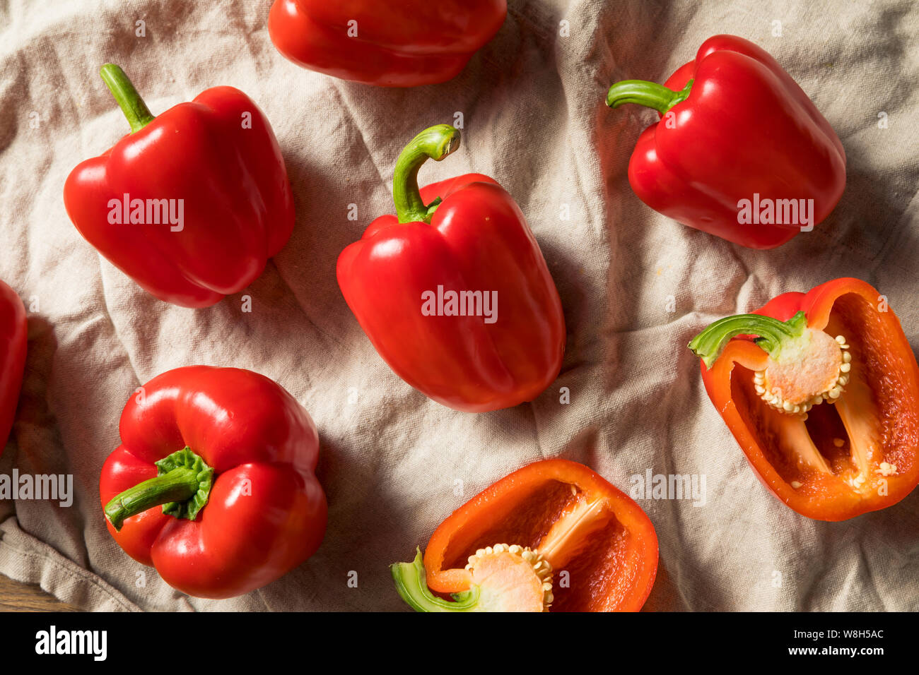 Raw Red Organic Bell Peppers Ready to Cook Stock Photo - Alamy
