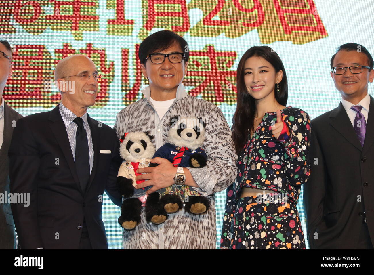 Hong Kong action star Jackie Chan, second left, and Chinese actress Zhu ...