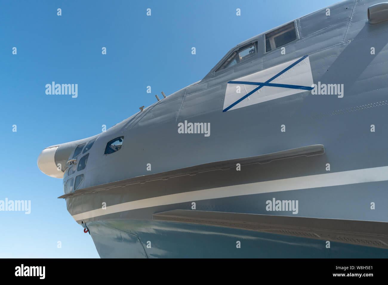 Nose of military airplane with ensign of Russian Navy. Copy space. Blue ...