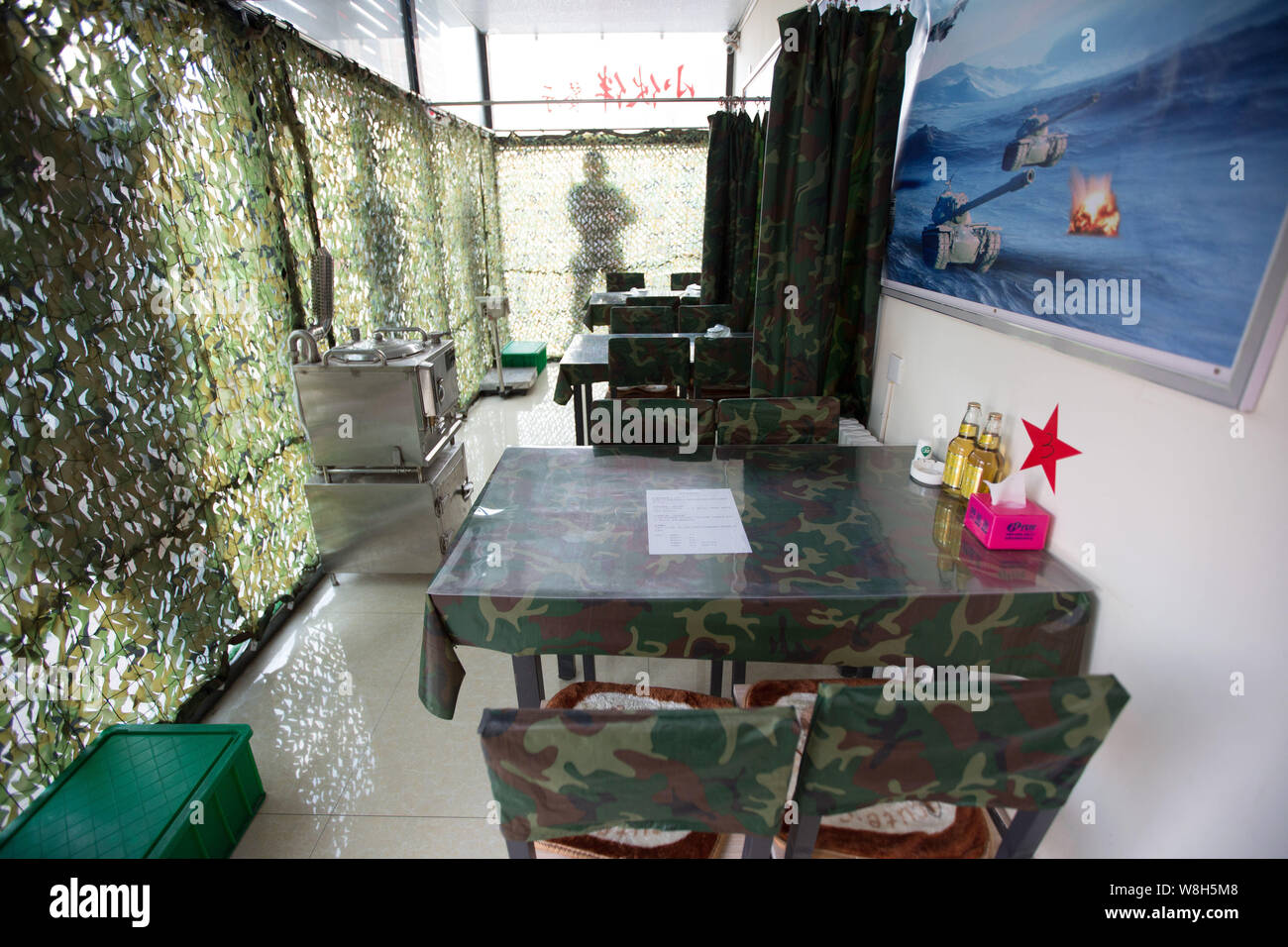 Interior view of the military-themed restaurant whose owners equip it ...