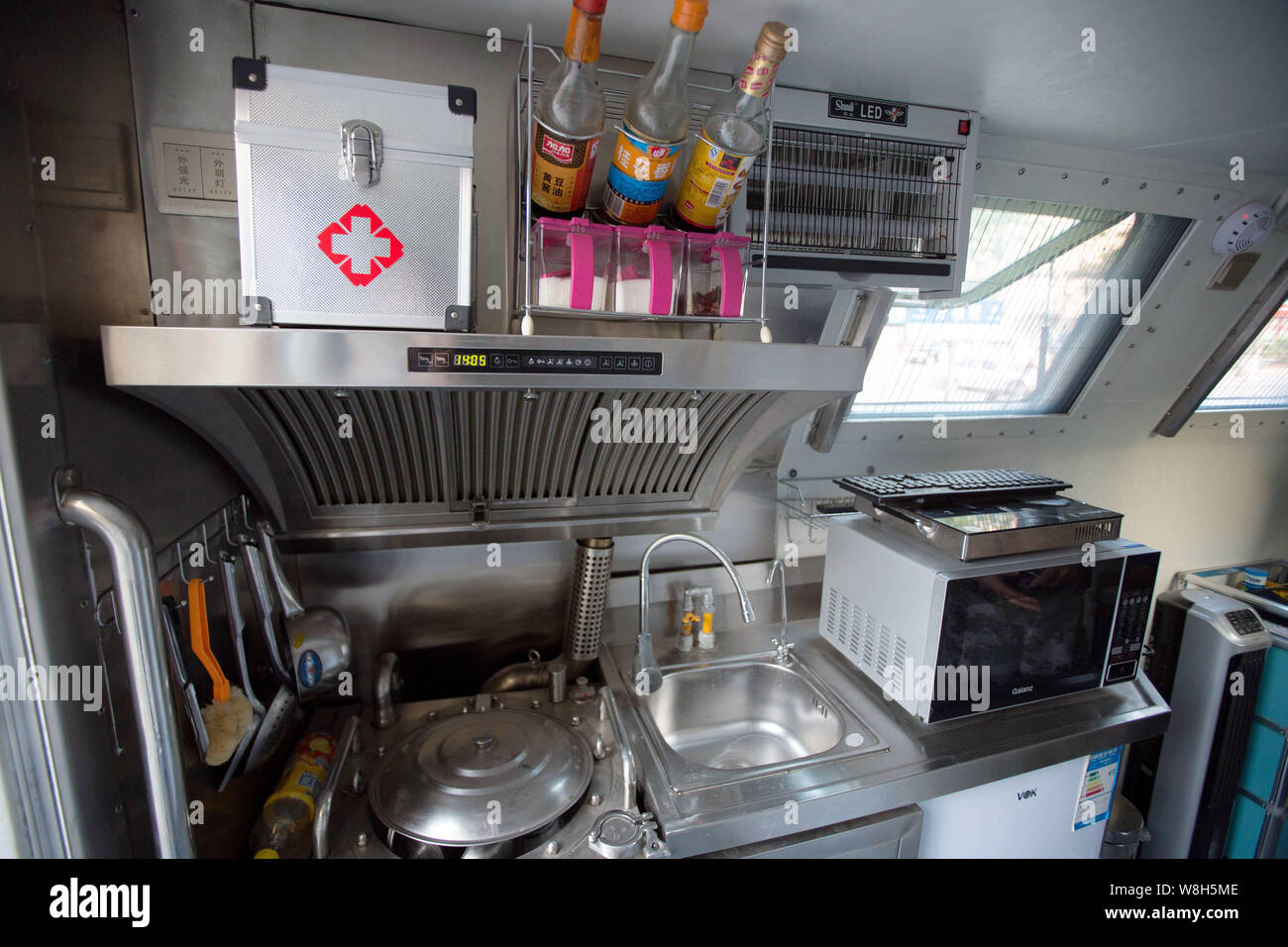Cooking utensils and appliances are seen inside the mobile armored ...