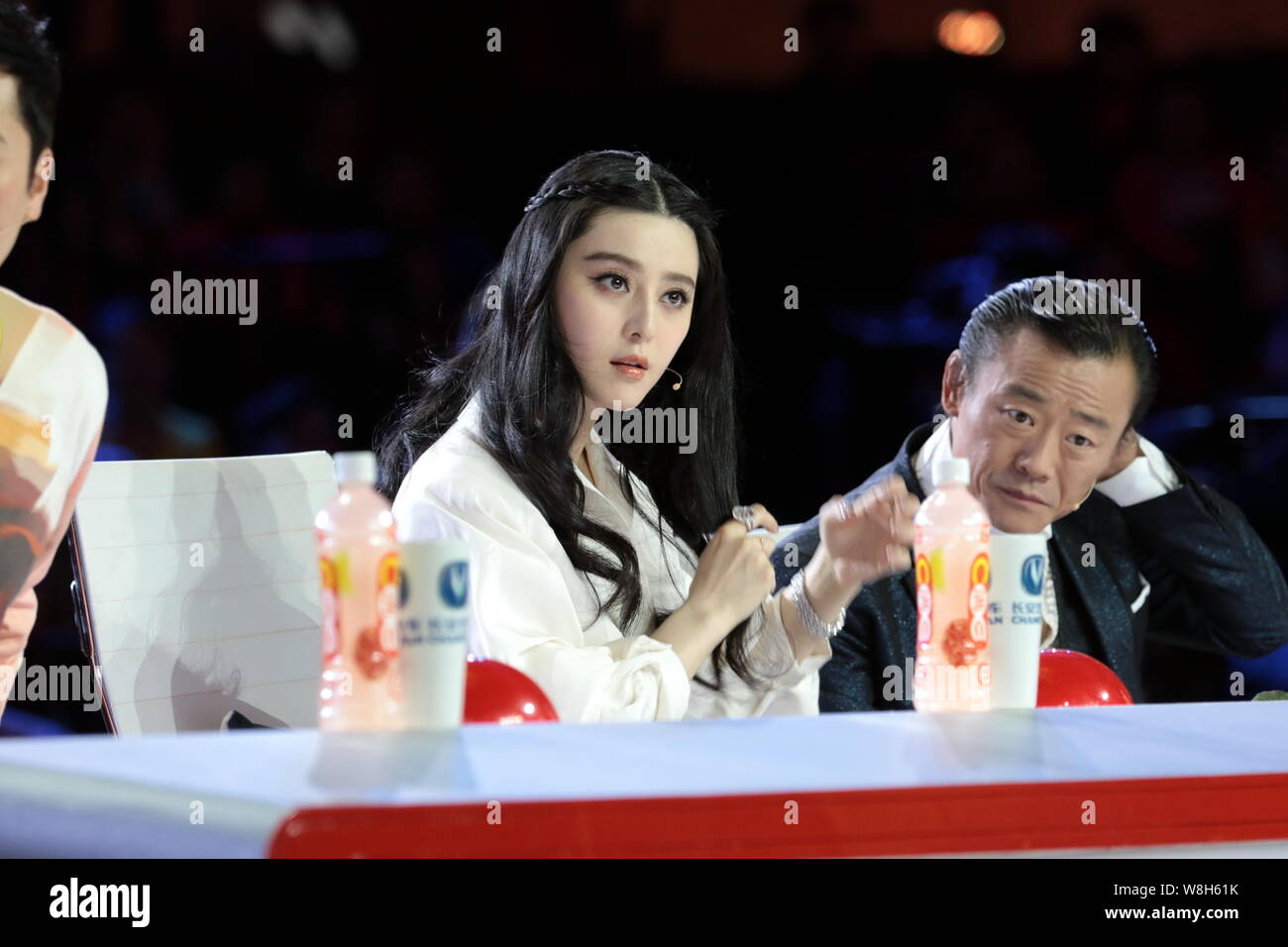 Chinese actress Fan Bingbing, left, and comedian Zhou Libo attend a recording session of the ...