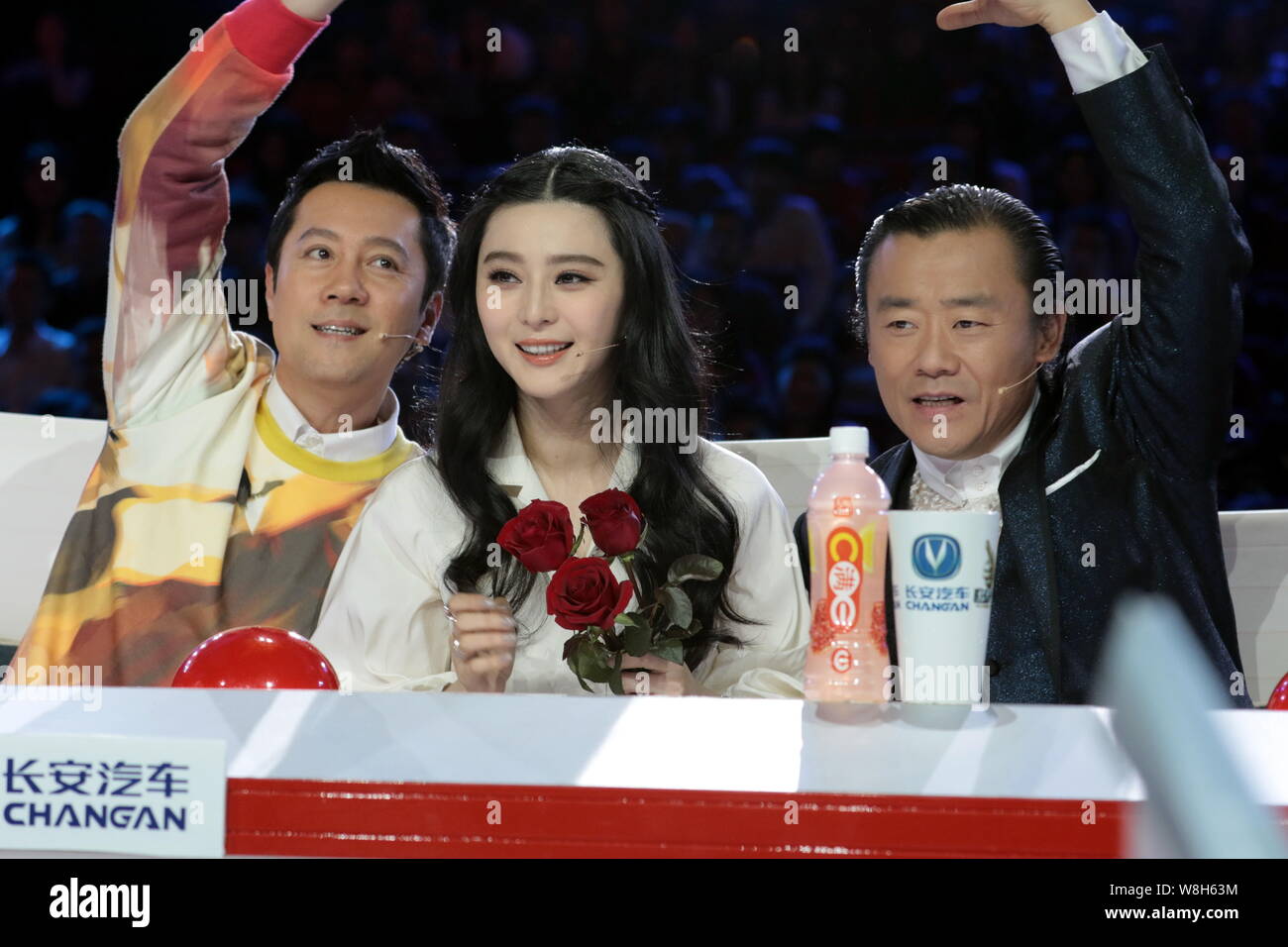 (From left) Chinese singer Cai Guoqing, actress Fan Bingbing and comedian Zhou Libo pose during ...