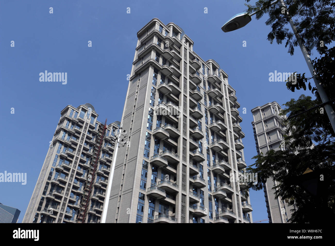 --FILE--Newly-built high-rise residential apartment buildings are ...