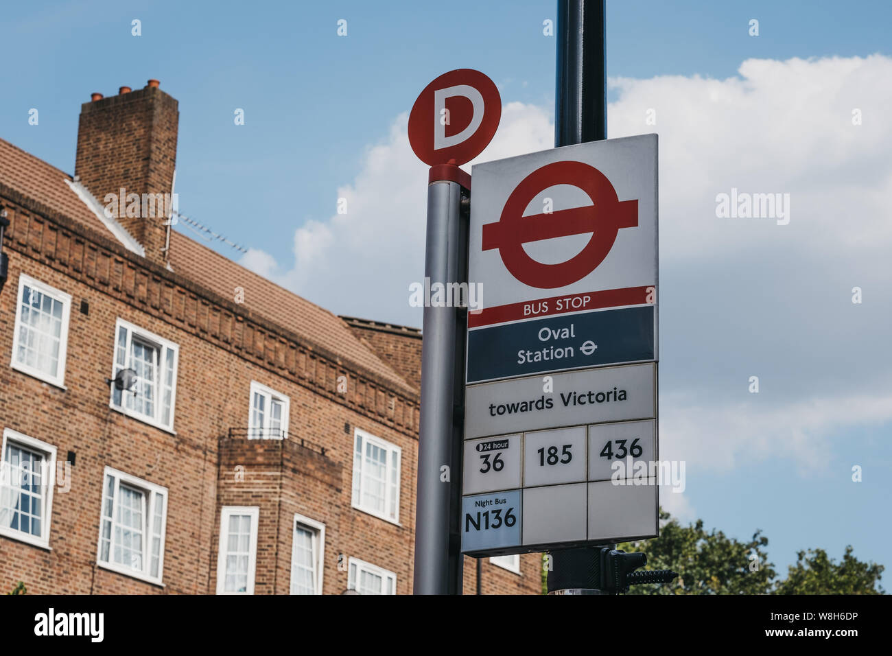 London, UK - July 16, 2019: Close up of bus stop sign for Oval Station ...