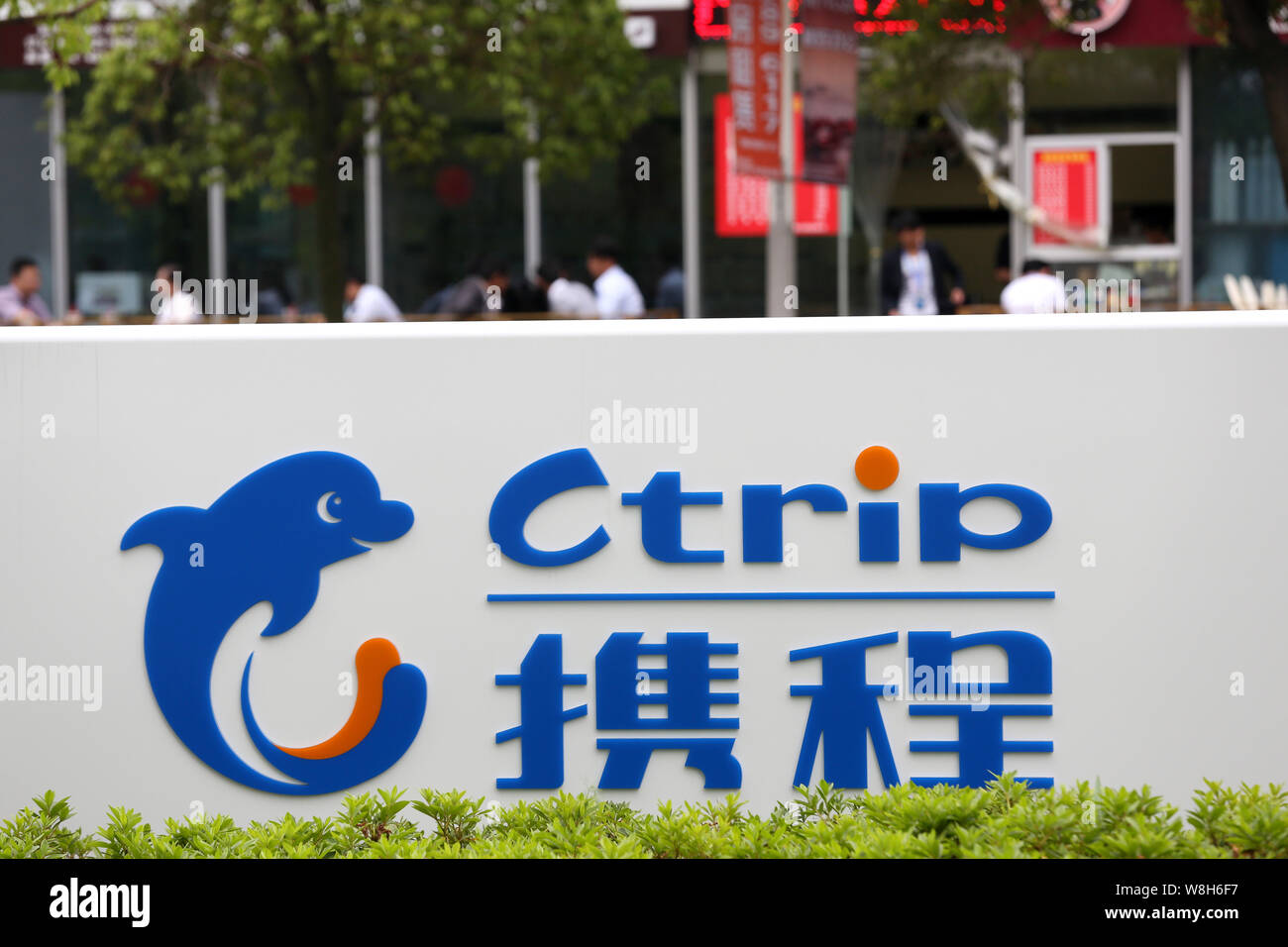 --FILE--A signboard of Chinese online travel agency Ctrip is pictured ...