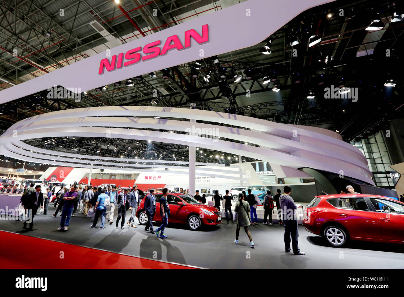 --FILE--People visit the stand of Nissan during the 16th Shanghai ...