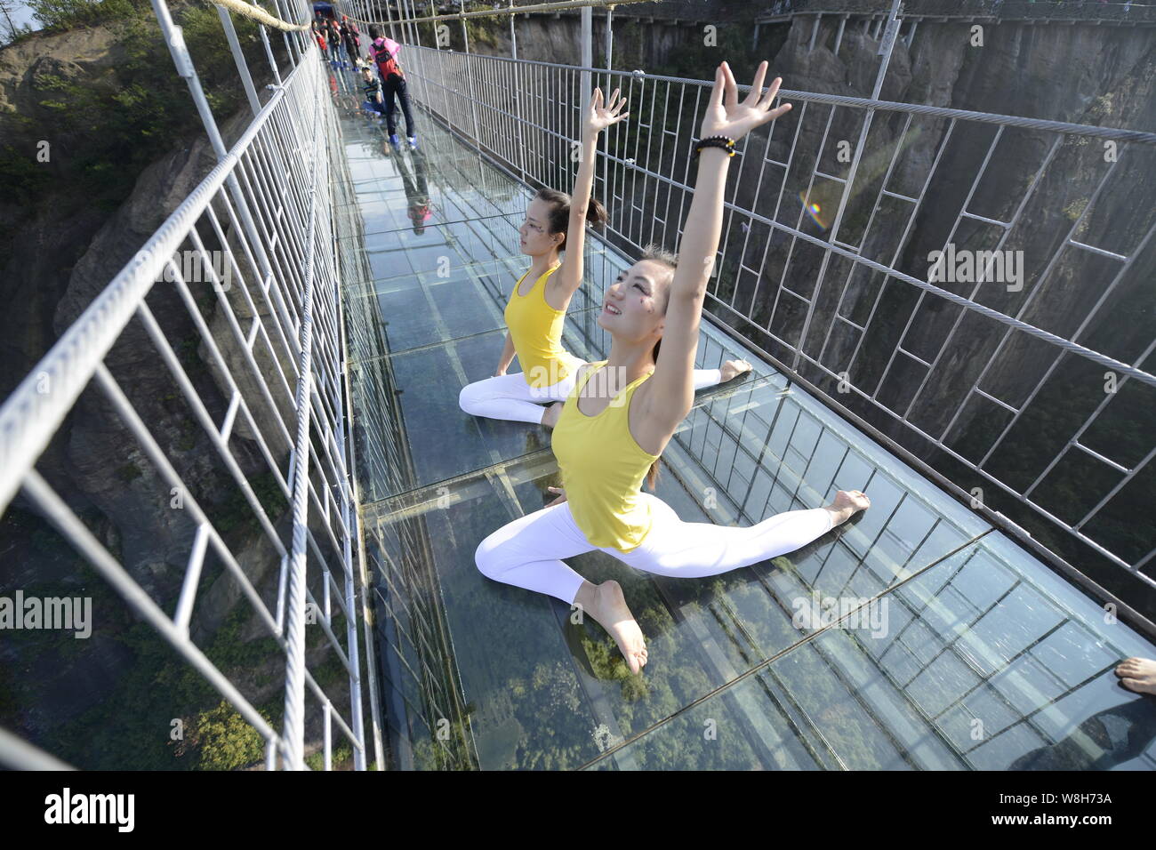 Chinese women perform yoga on the 180-meter-high and 300 meter-long ...