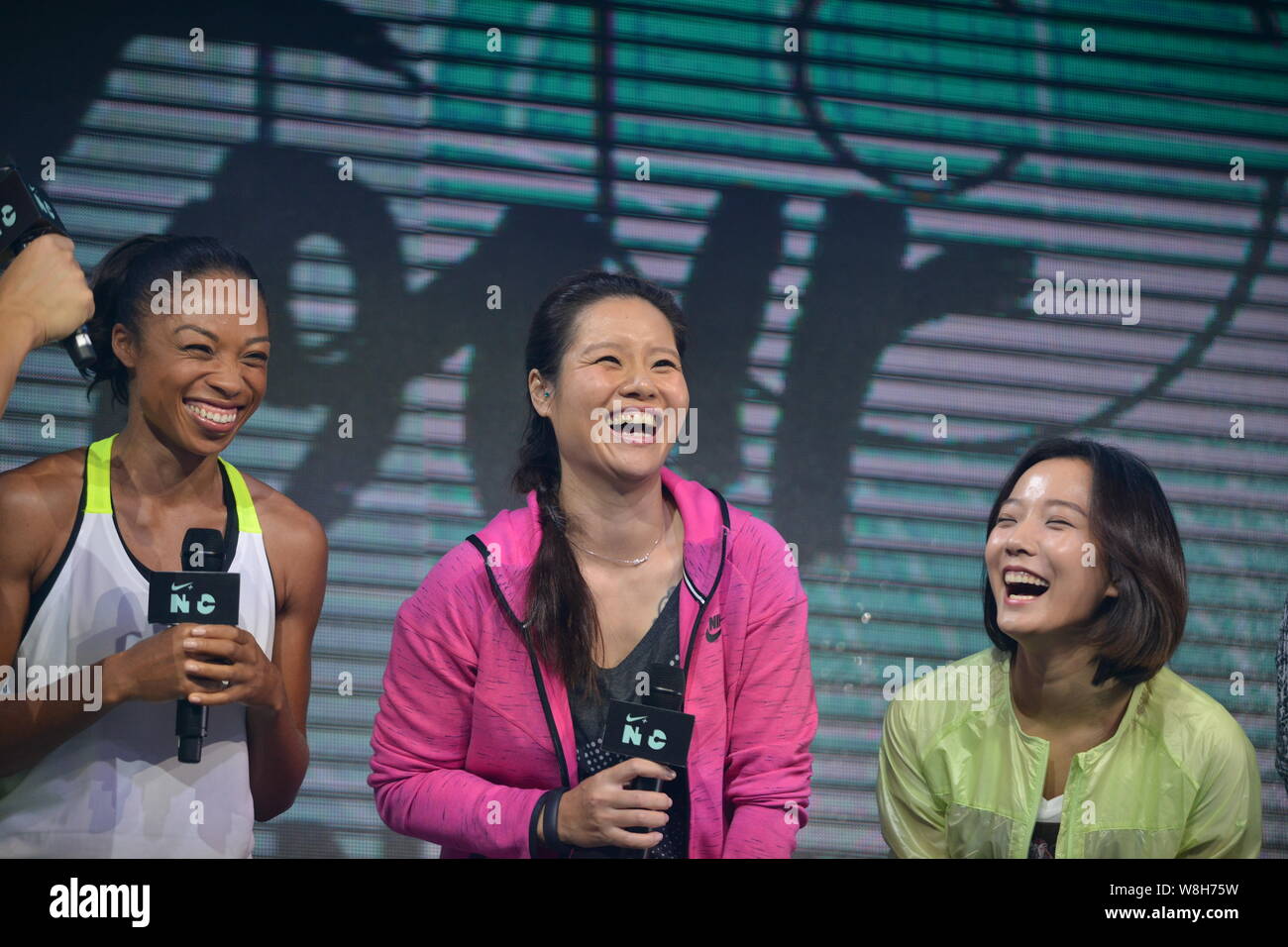 Retired Chinese tennis star Li Na, center, and Chinese actress Wang ...