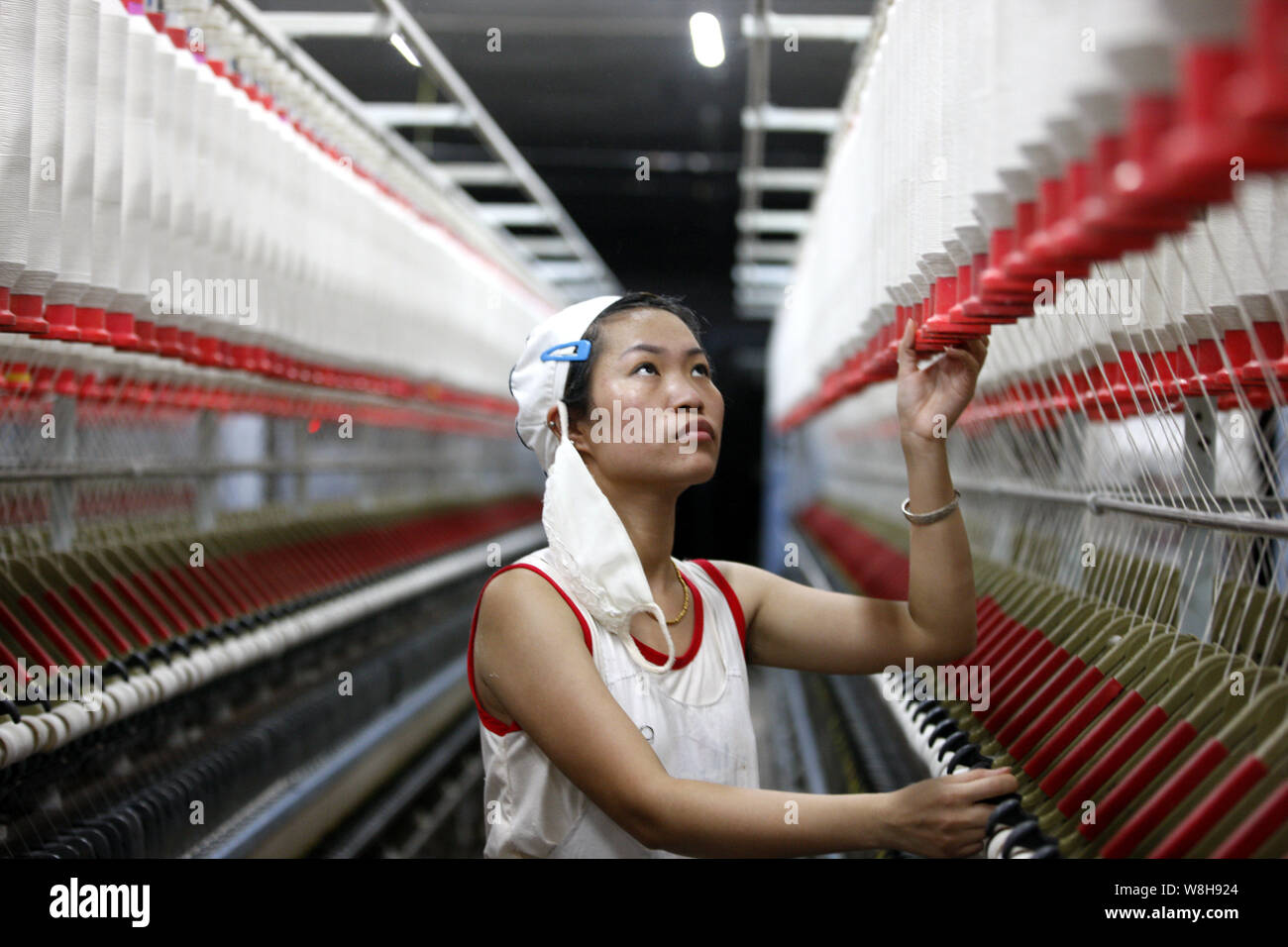 Garment factory worker southeast asia hi-res stock photography and images - Alamy