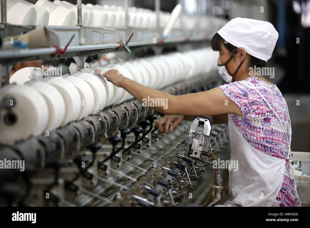 Garment factory worker southeast asia hi-res stock photography and images - Alamy