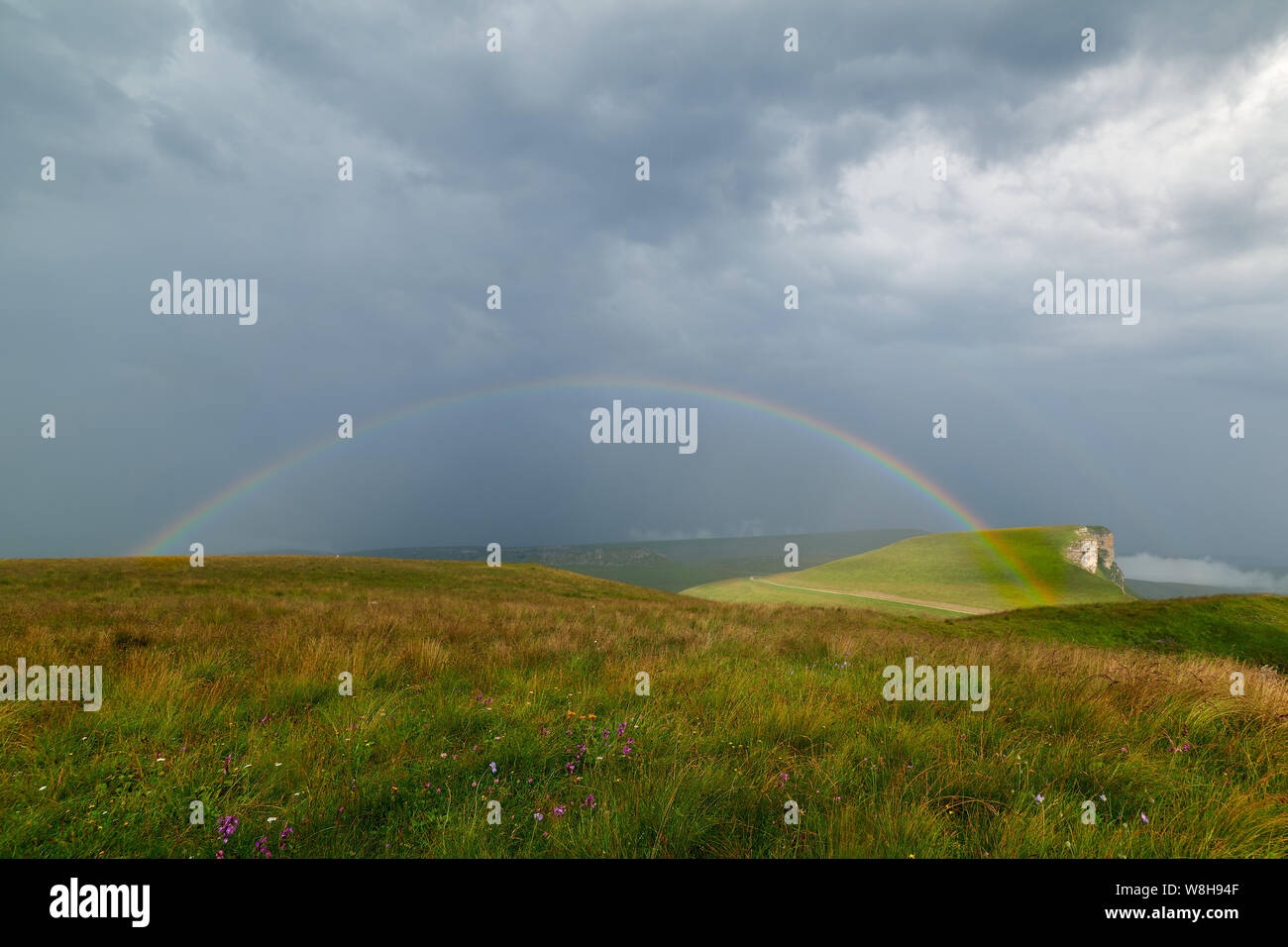 Beautiful rainbow over valley hi-res stock photography and images - Alamy