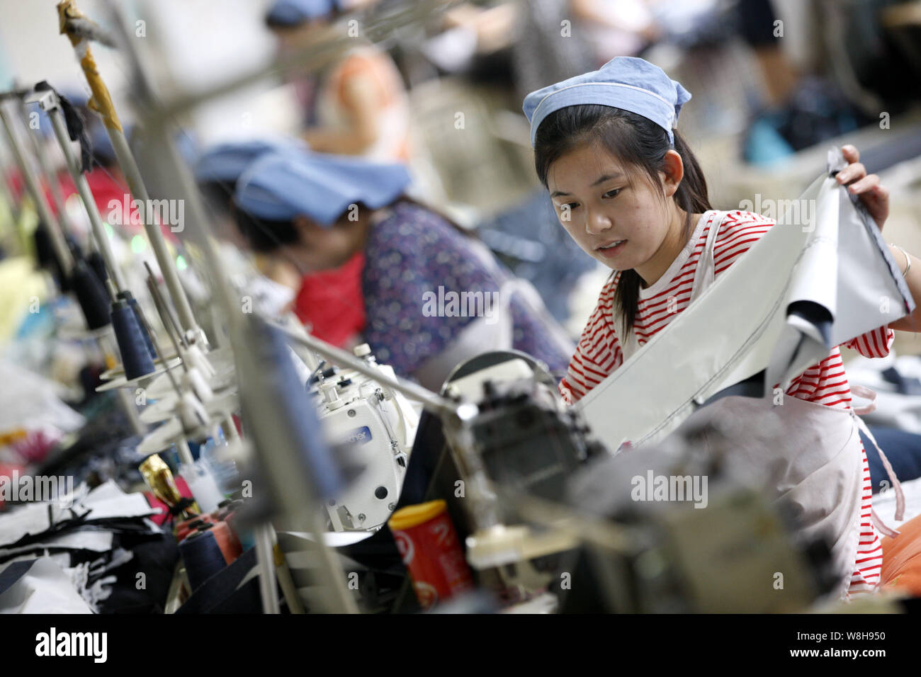 Garment factory china hi-res stock photography and images - Alamy
